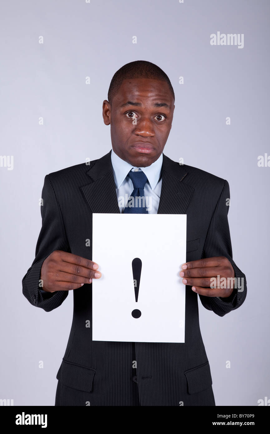 African businessman with a big exclamation point Stock Photo - Alamy