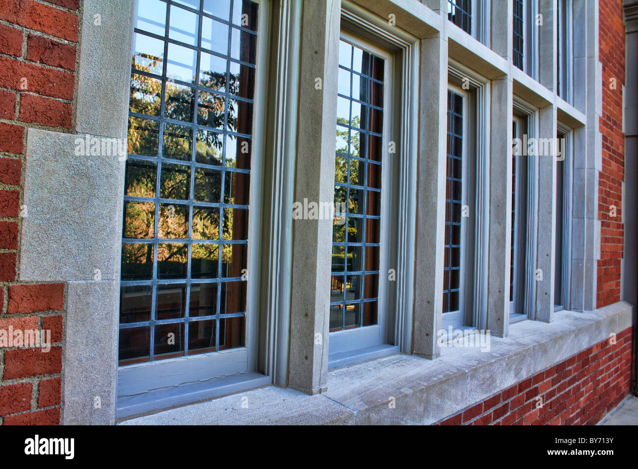 series of windows on brick building Stock Photo - Alamy