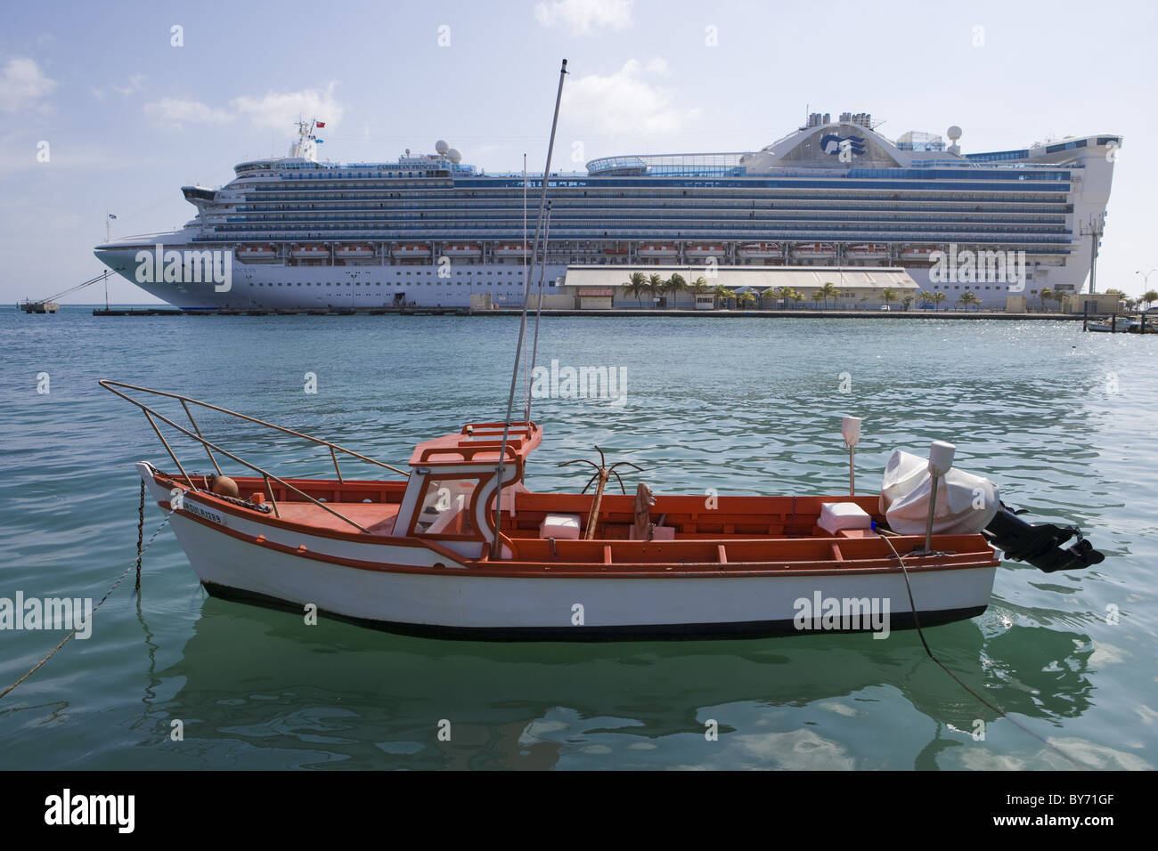 Fishing boat in harbor and cruiseship Caribbean Princess (Princess ...