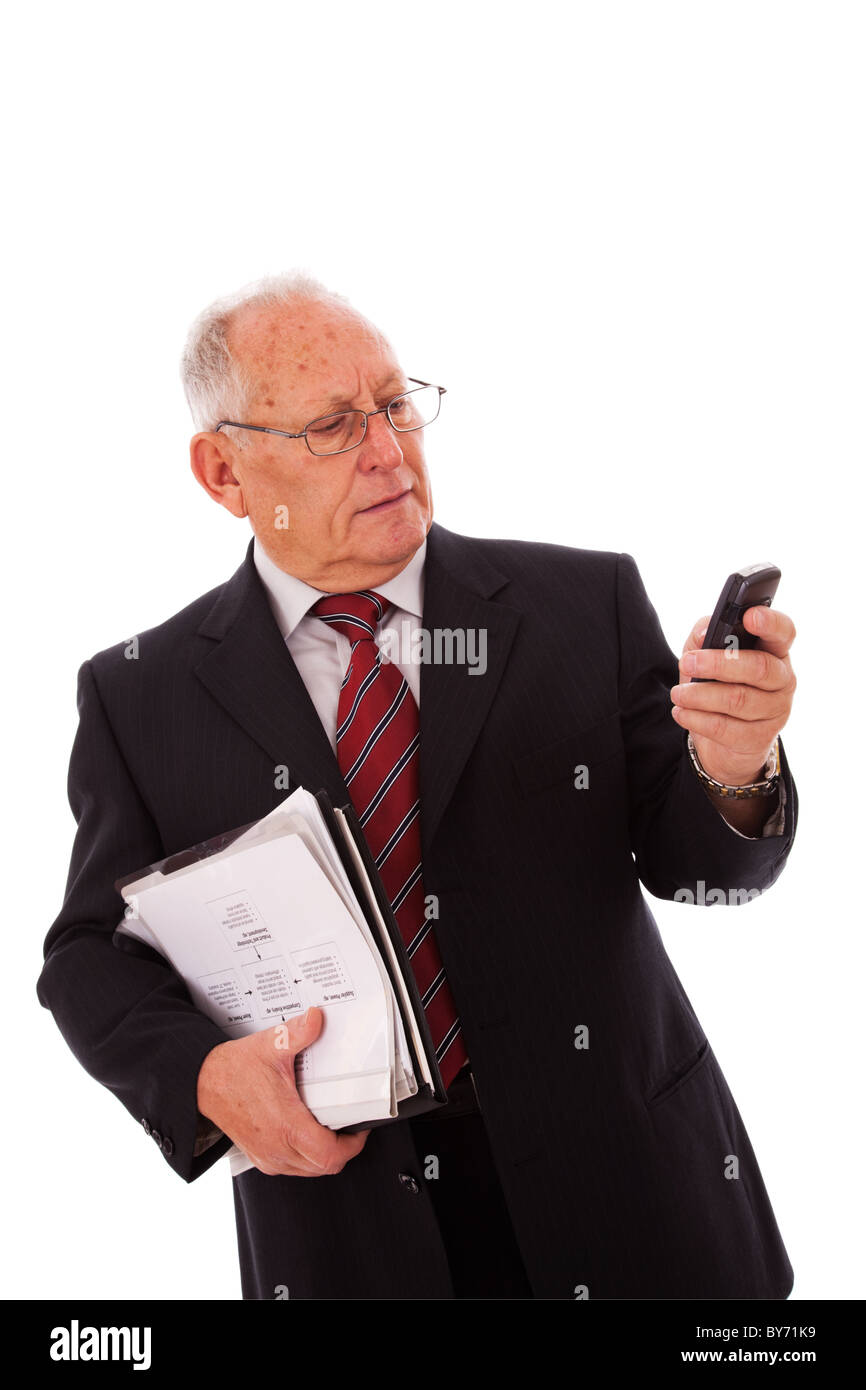 senior businessman talking on his cellular (isolated on white Stock ...