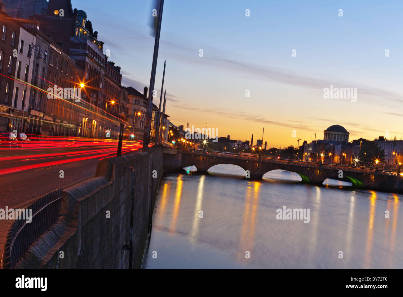 Wellington Quay, Grattan Bridge and the River Liffey in the evening ...