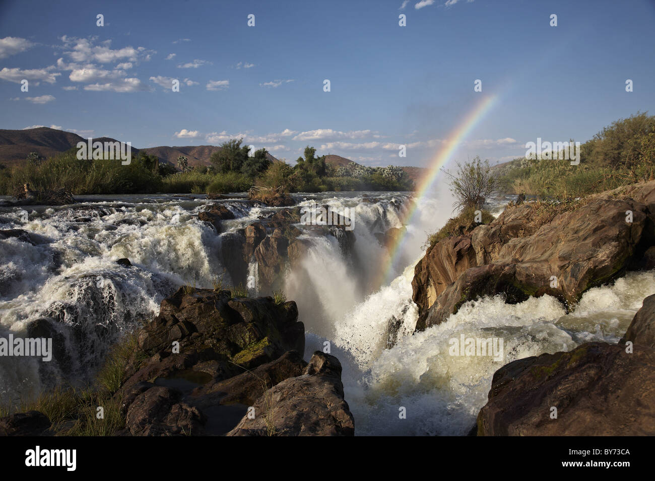 Epupa falls with rainbow, Namibia, Africa Stock Photo - Alamy