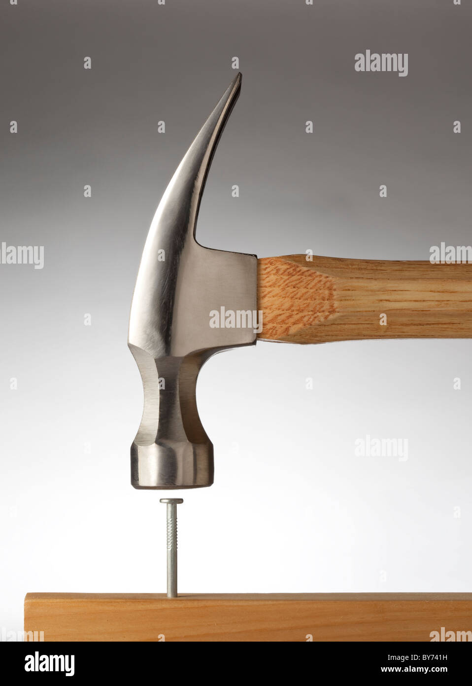 Hammer hitting nail hi-res stock photography and images - Alamy