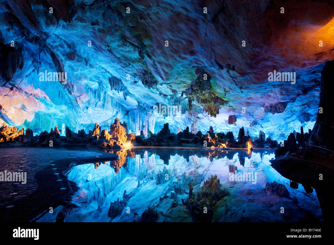 The beautifully illuminated Reed Flute Caves displaying the "Crystal ...
