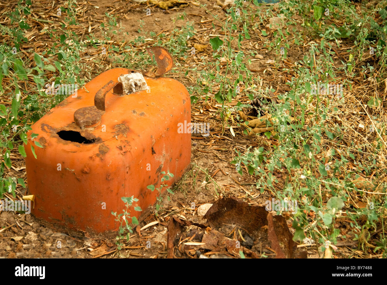 Rusty Gasoline Can on the autumnal ground Stock Photo - Alamy