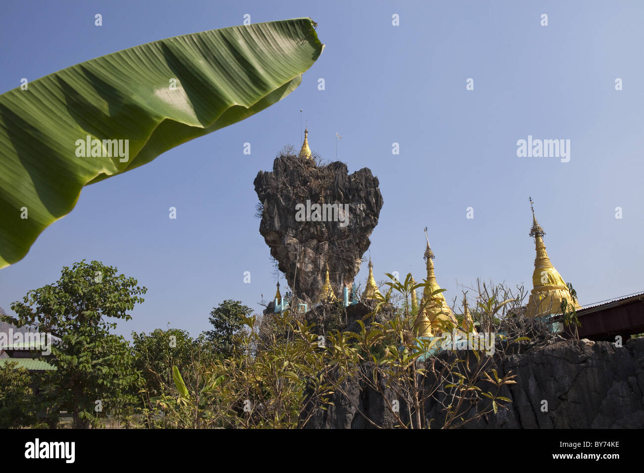 Kyauk Ka Lat Pagoda on a rock, karst mountains near Hpa-An, Kayin State ...