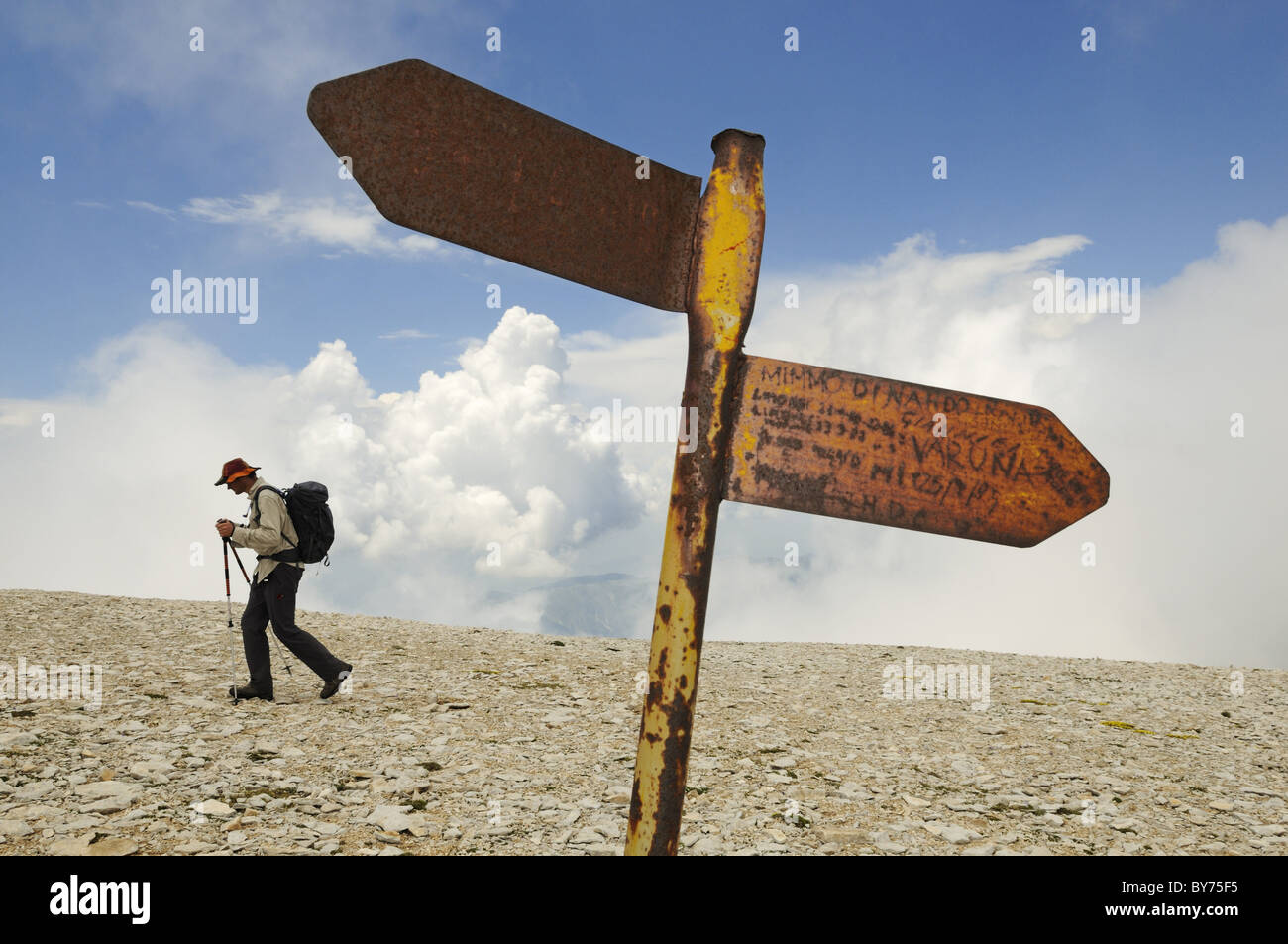 Hiker at summit plateau of Monte Amaro, Caramanico Terme, Maiella ...