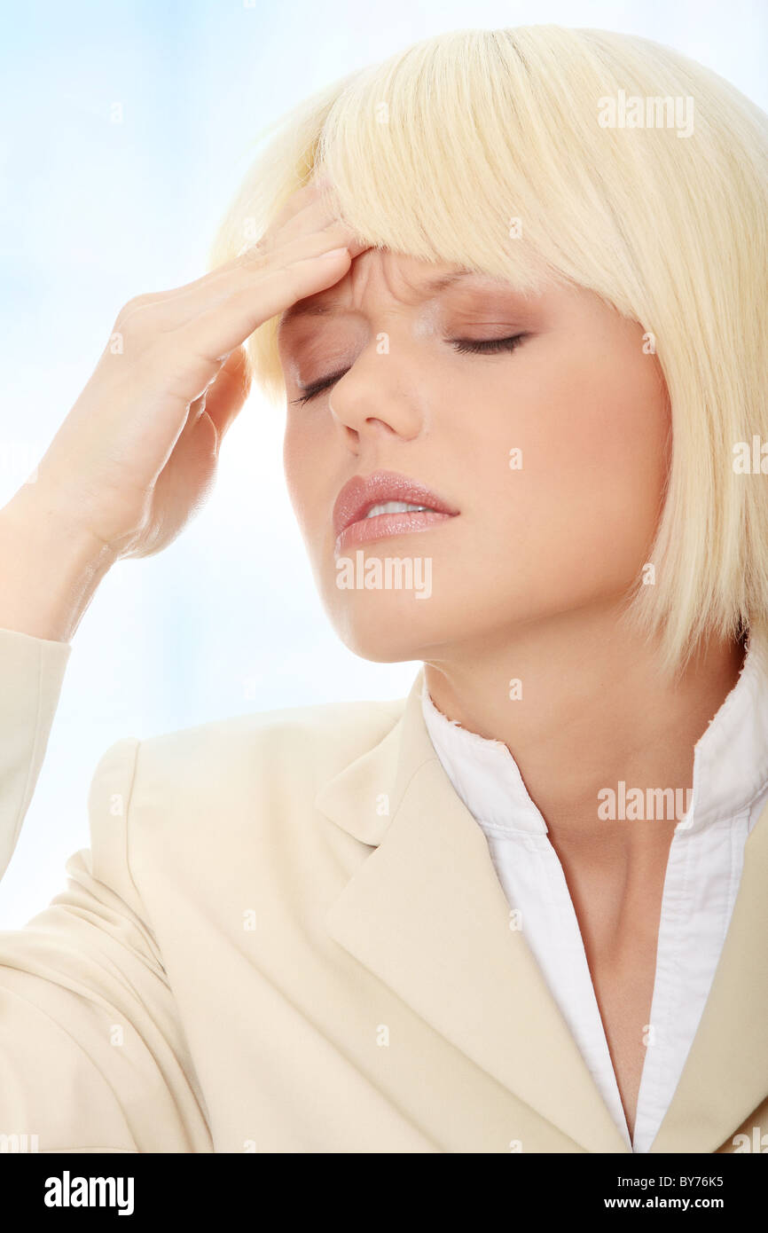 Young business woman with headache,Over abstract blue background Stock ...