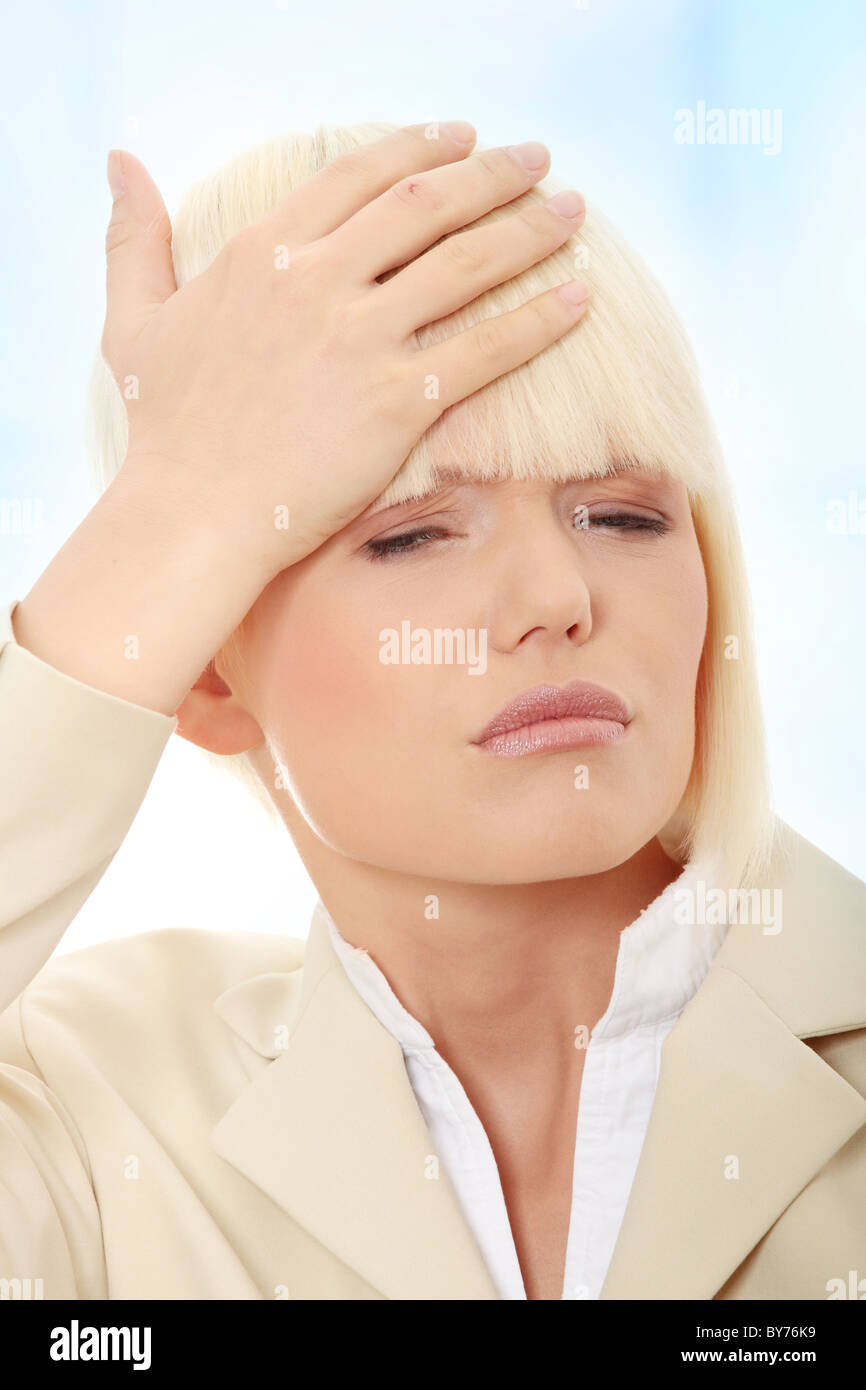 Young business woman with headache,Over abstract blue background Stock ...