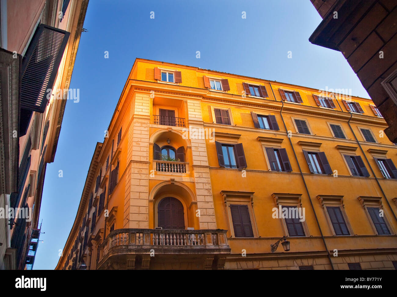 Bright Yellow Builidng Blue Skies on the Roman Streets Via Della Pigna ...
