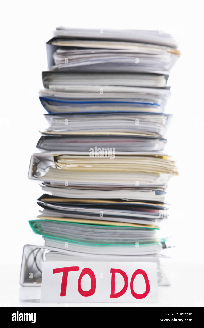 Paperwork to do concept with to do word in front of pile of paper ...
