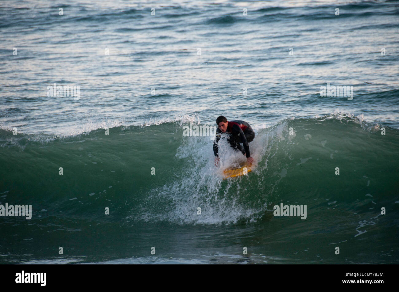Surfing at St Brelades Bay, Jersey, Channel Islands Stock Photo - Alamy