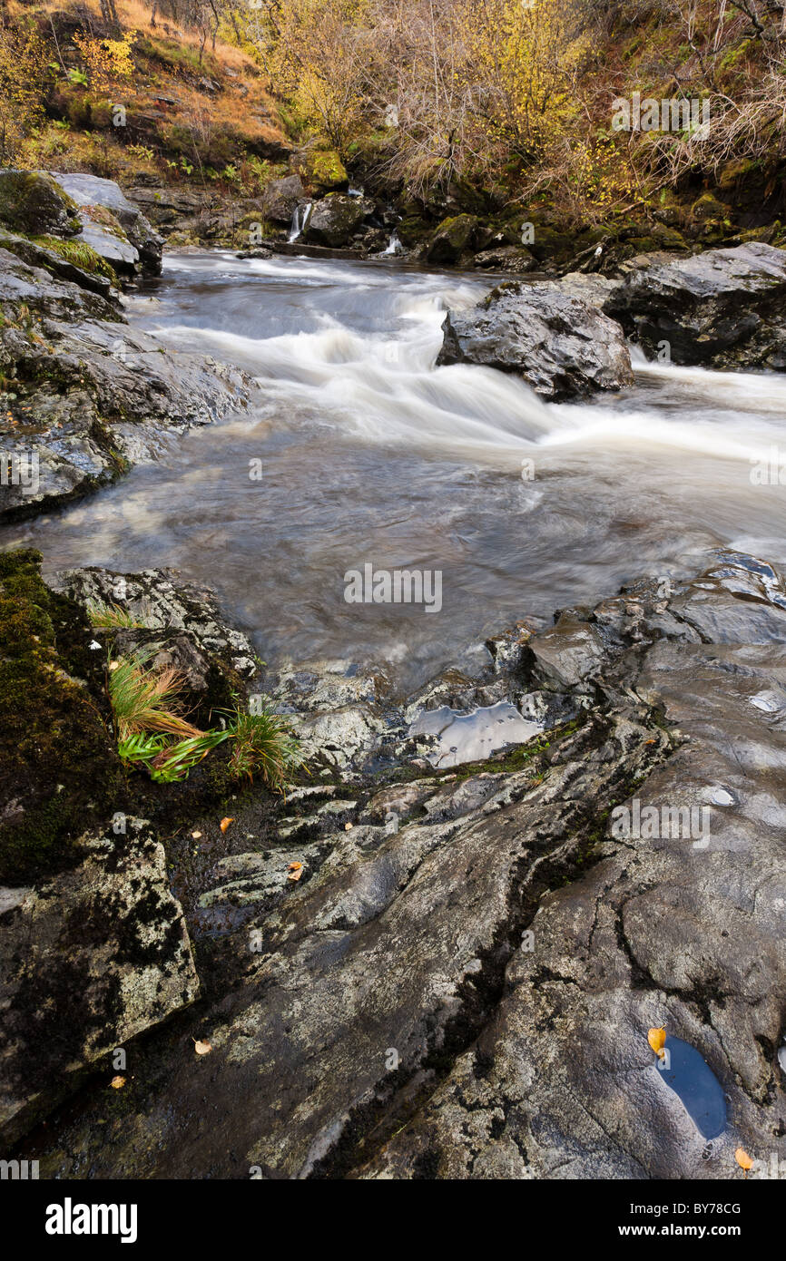 Rushing waters of the river Falloch flowing from the Falls of Falloch ...