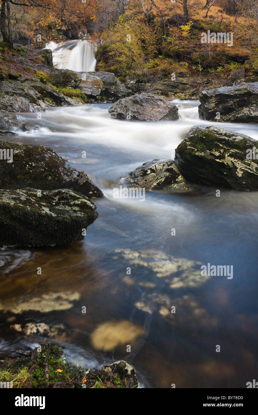 Rushing waters of the river Falloch flowing from the Falls of Falloch ...
