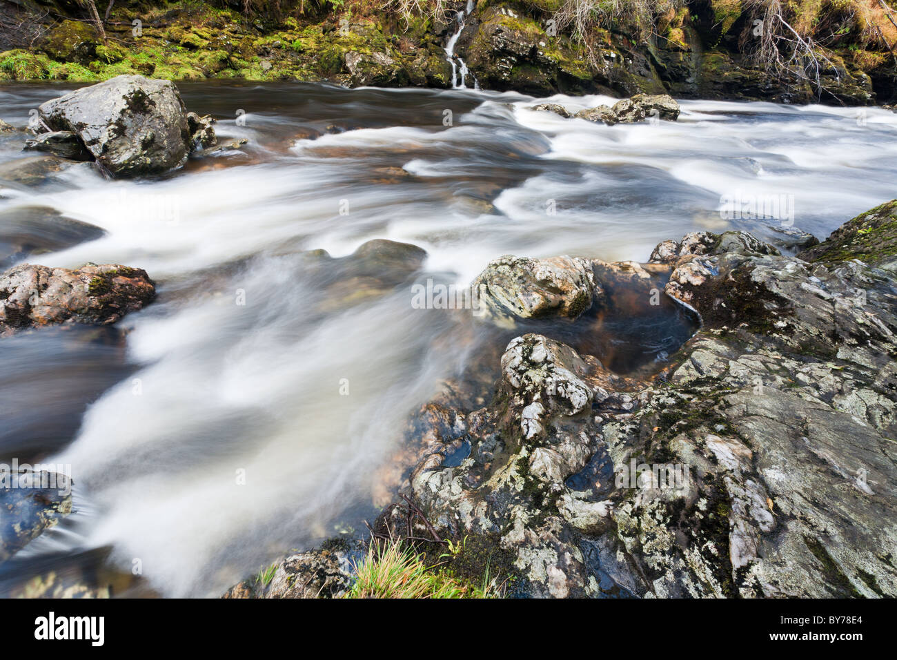 Rushing waters of the river Falloch flowing from the Falls of Falloch ...