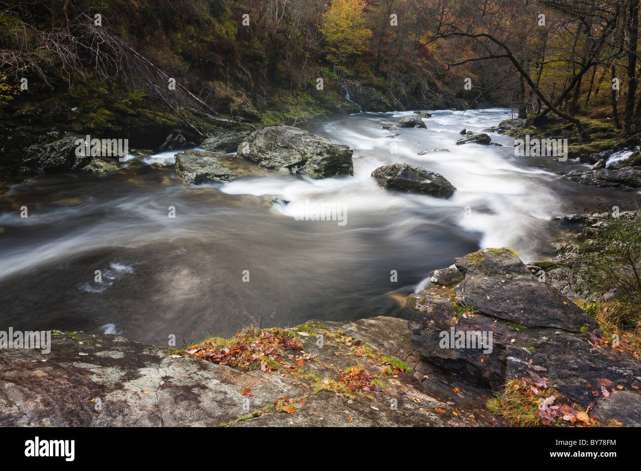 Rushing waters of the river Falloch flowing from the Falls of Falloch ...
