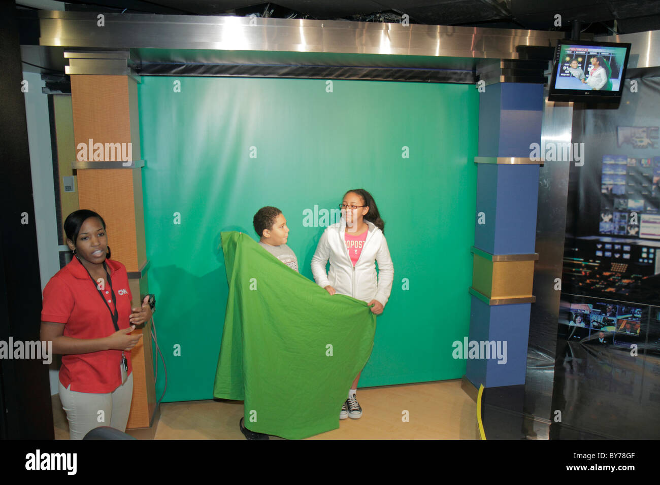 Studio tour green screen black woman female guide speaking explaining ...