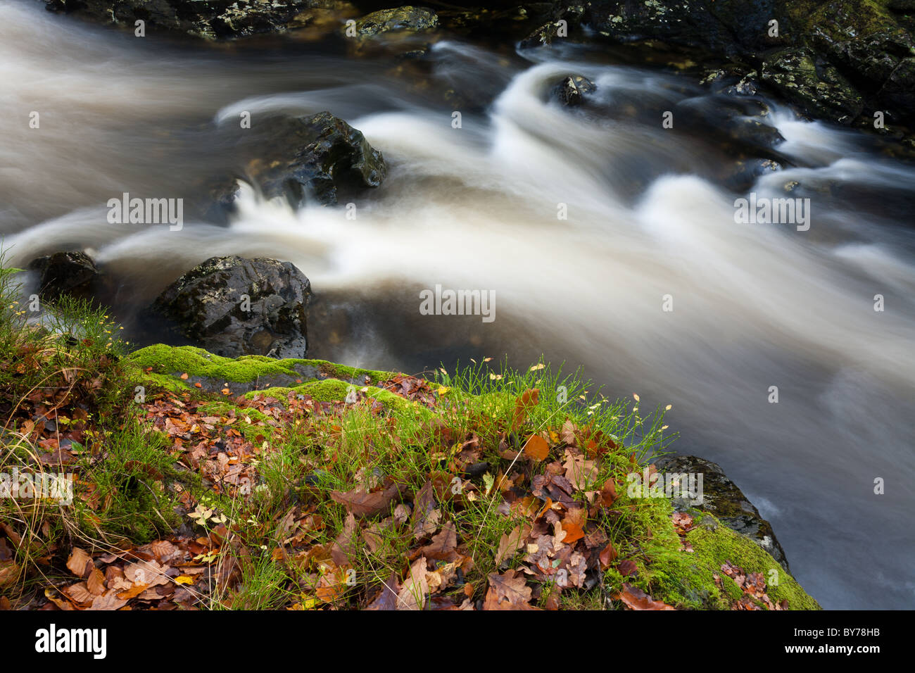 Rushing waters of the river Falloch flowing from the Falls of Falloch ...