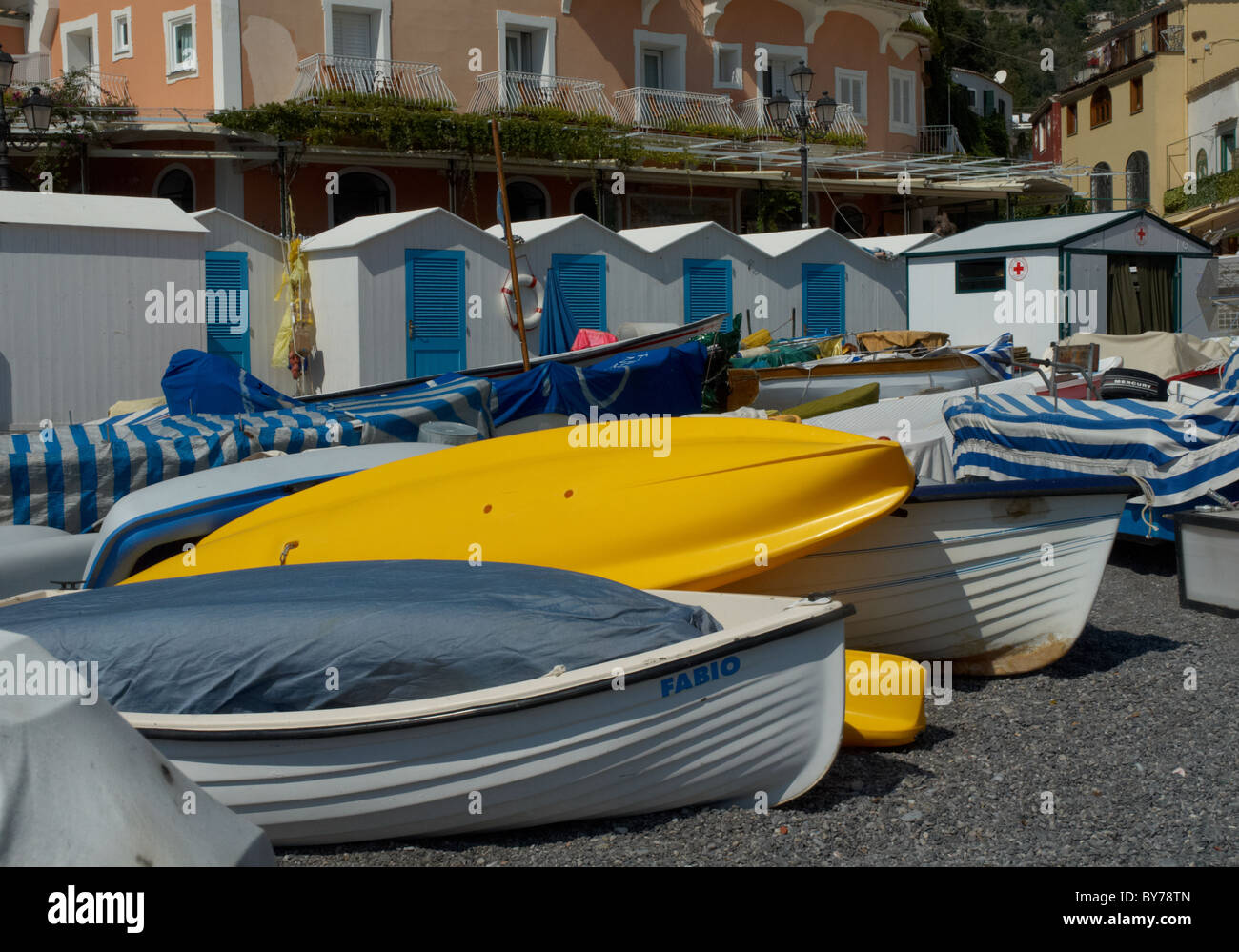 Boats and beach huts Stock Photo - Alamy