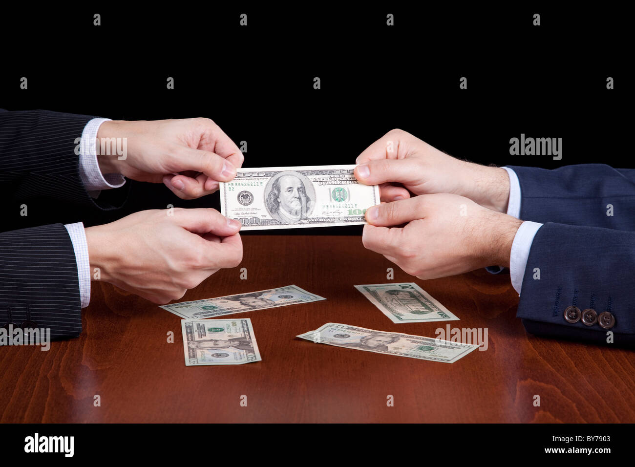 businessman giving money Stock Photo - Alamy