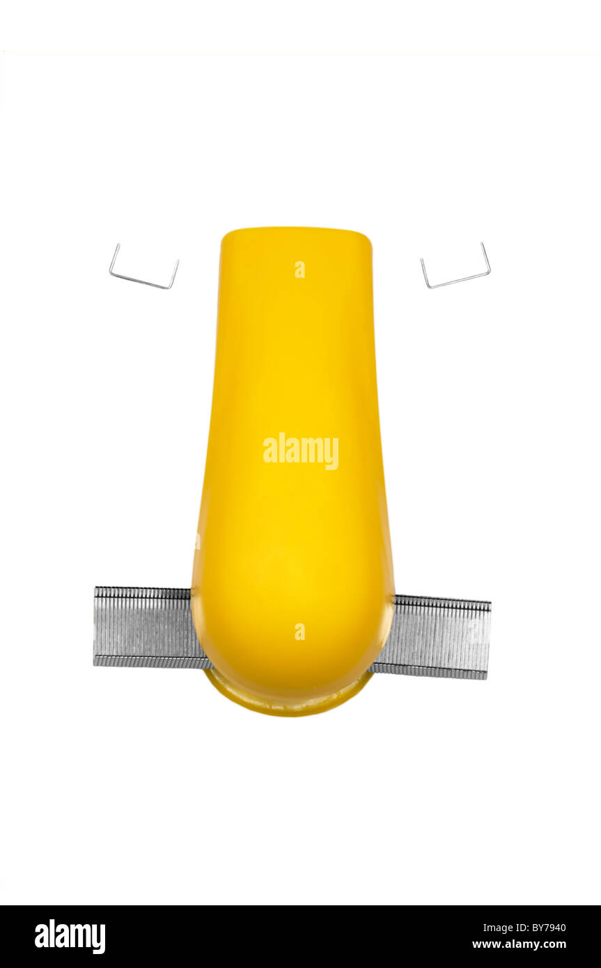 staples inside yellow stapler isolated on white background Stock Photo ...