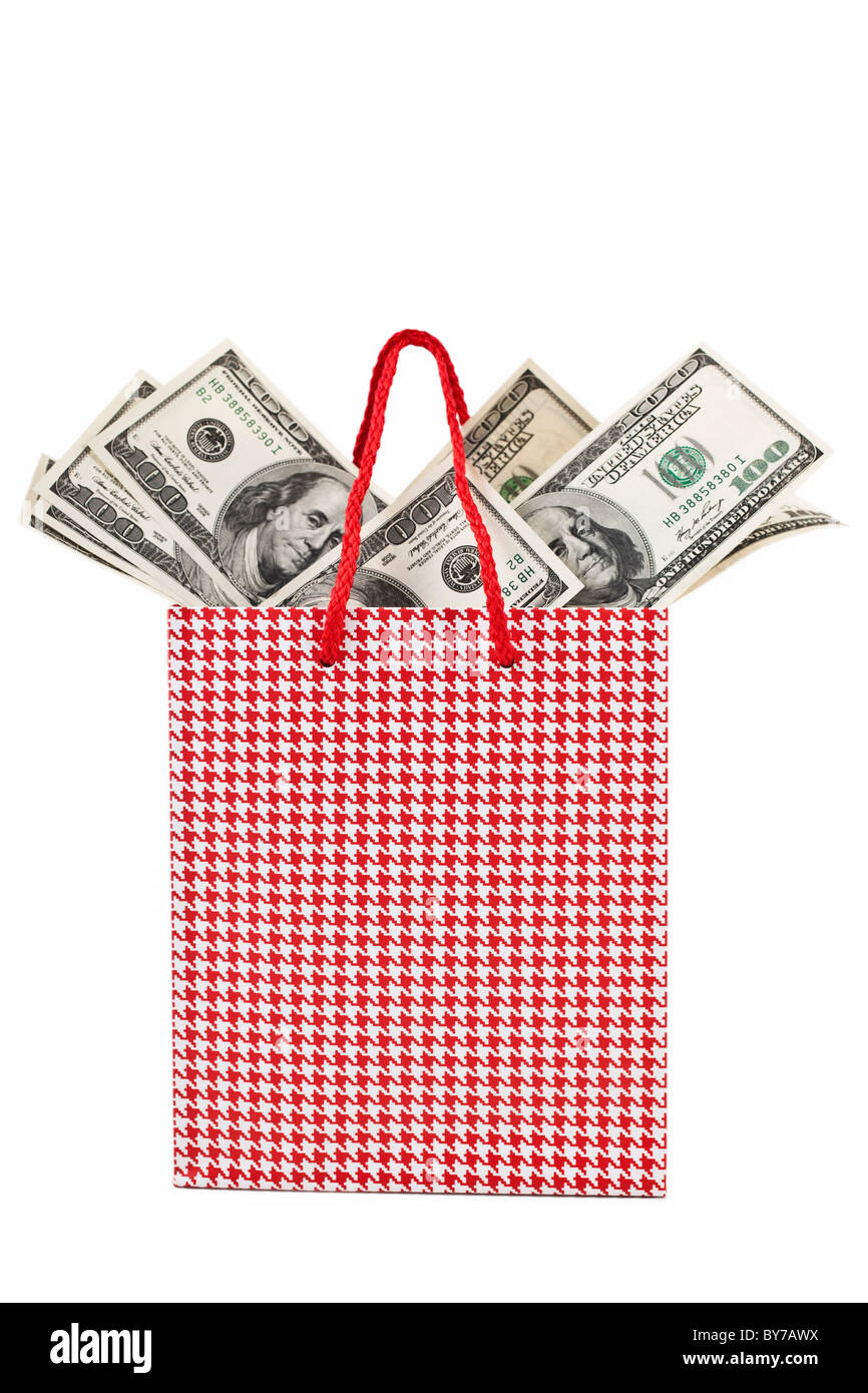 Red Gift package withhundred-dollar bills isolated on white background ...