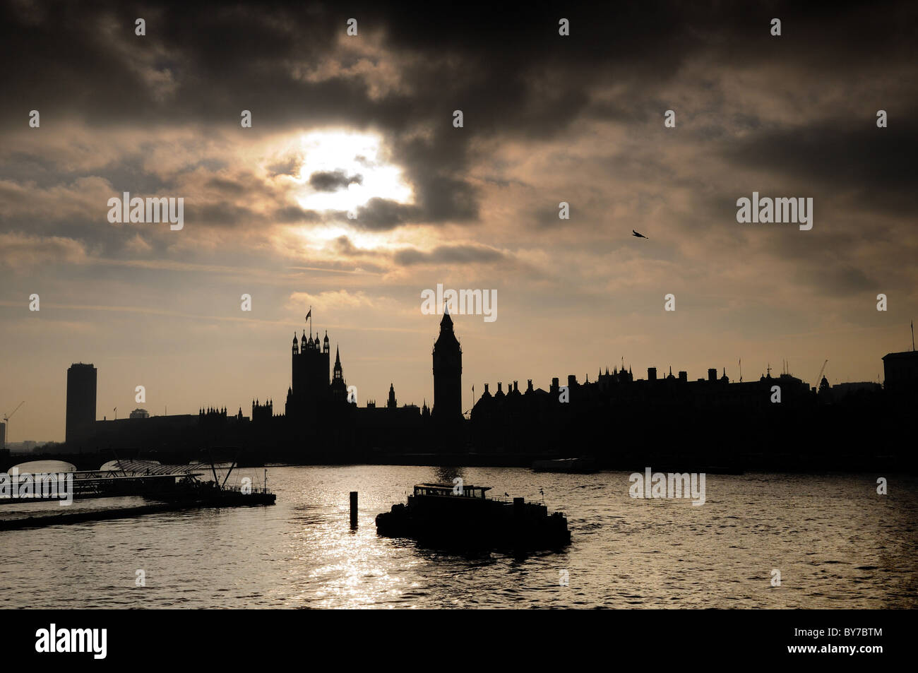 River Thames with the Houses of Parliament in silhouette ,London ...