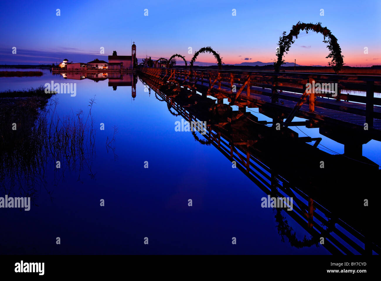 Porto Lagos, Greece. The bridge that connects St. Nicholas monastery ...