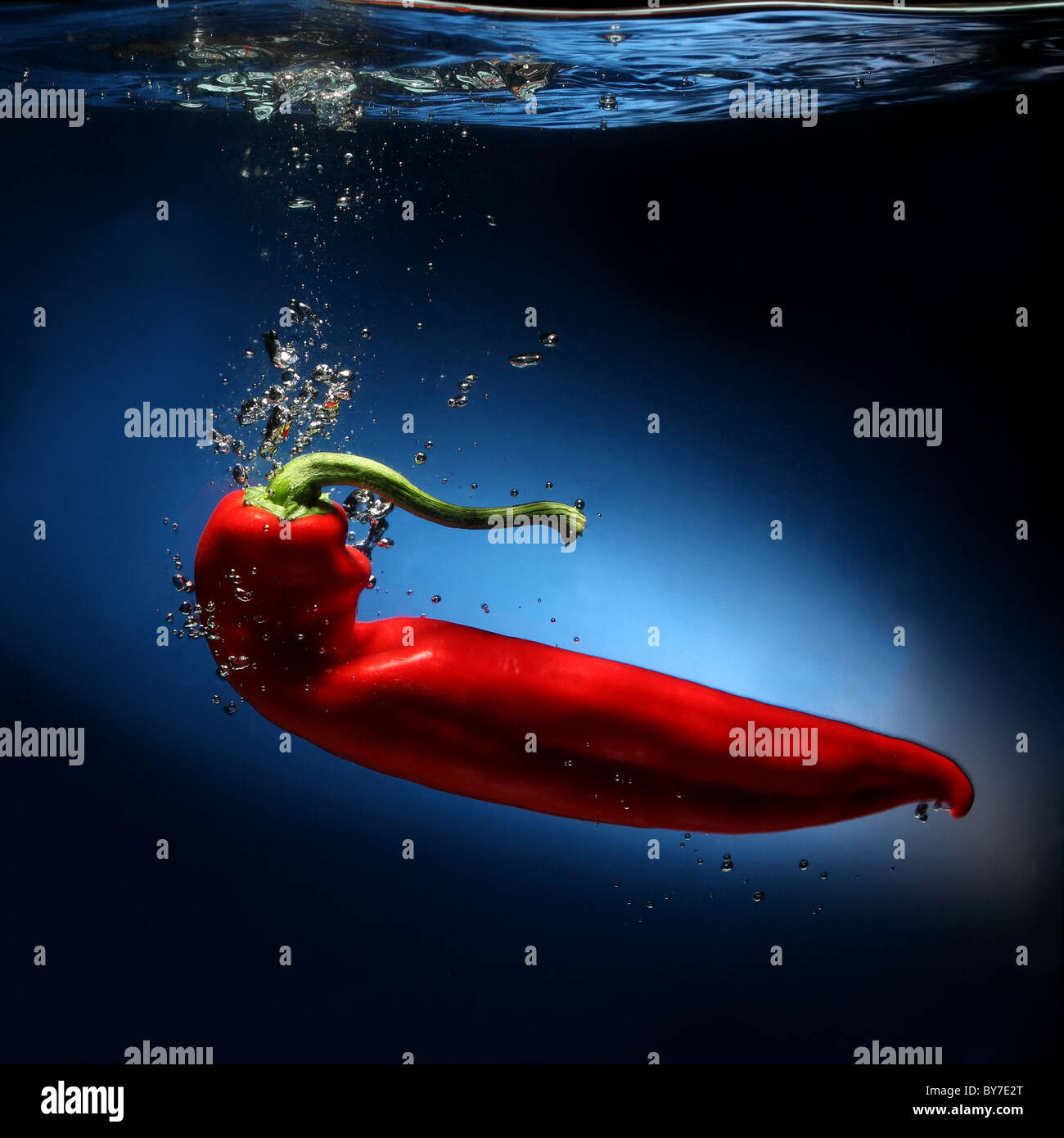 red raw pepper water Stock Photo - Alamy