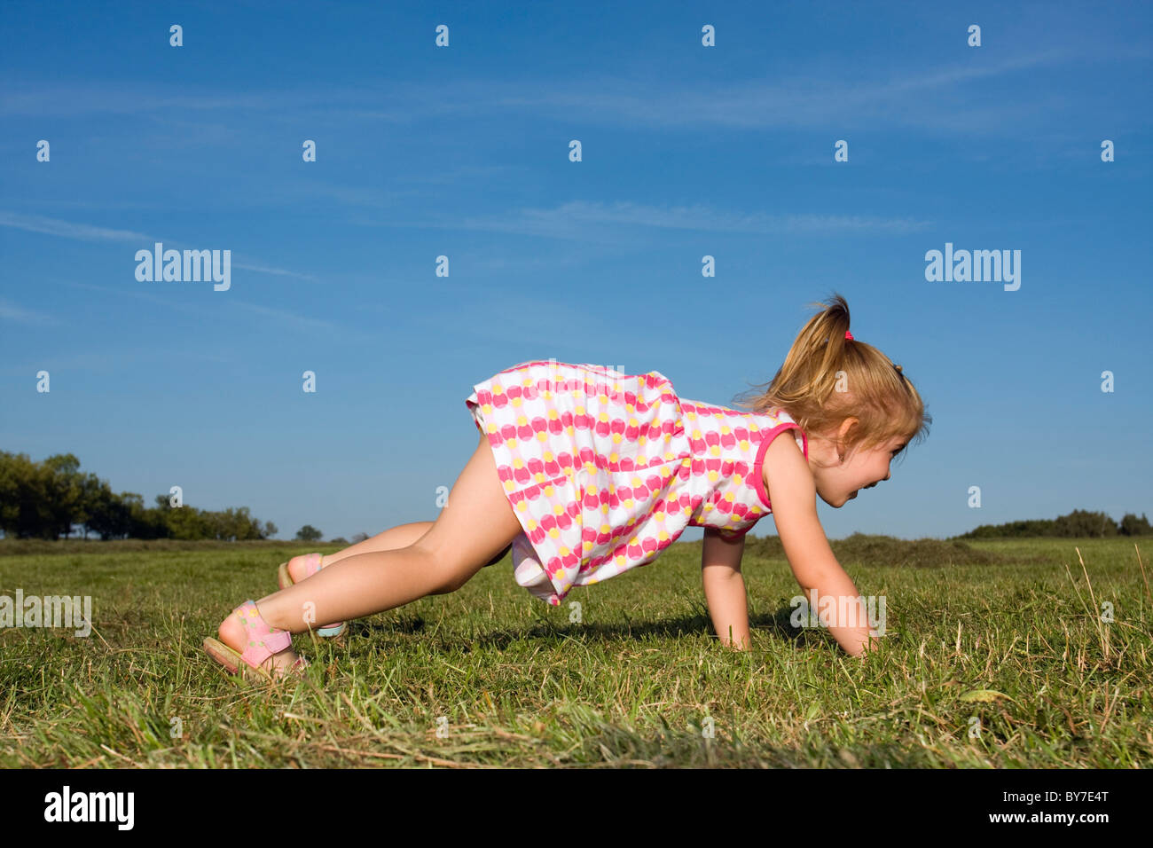 Girl 3 Years Playing On The Green Field Stock Photo Alamy