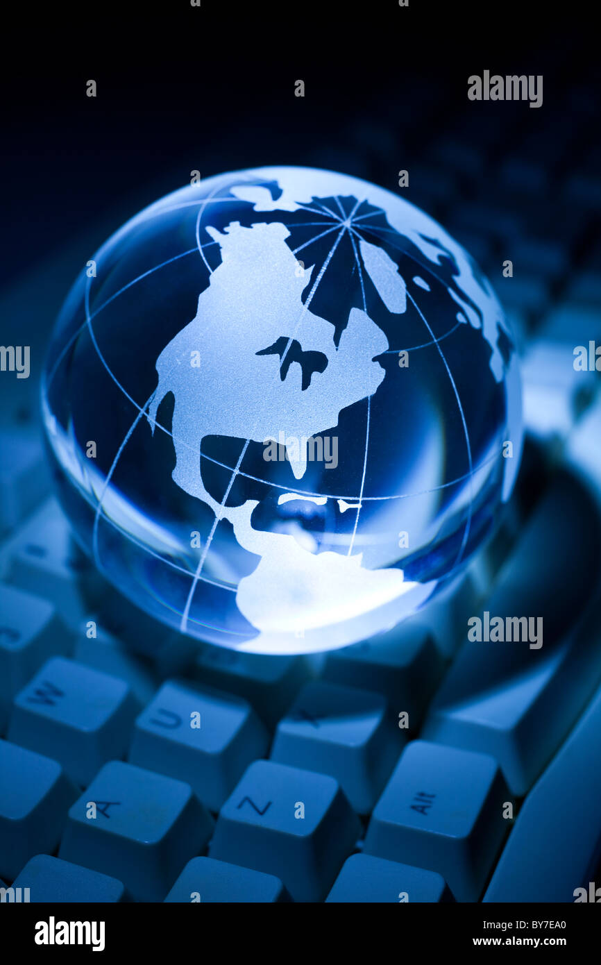 Blue Globe and Computer Keyboard for background Stock Photo - Alamy
