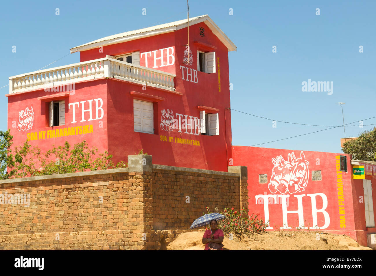 Building painted in the brand colours of THB (Three Horses Beer) in ...