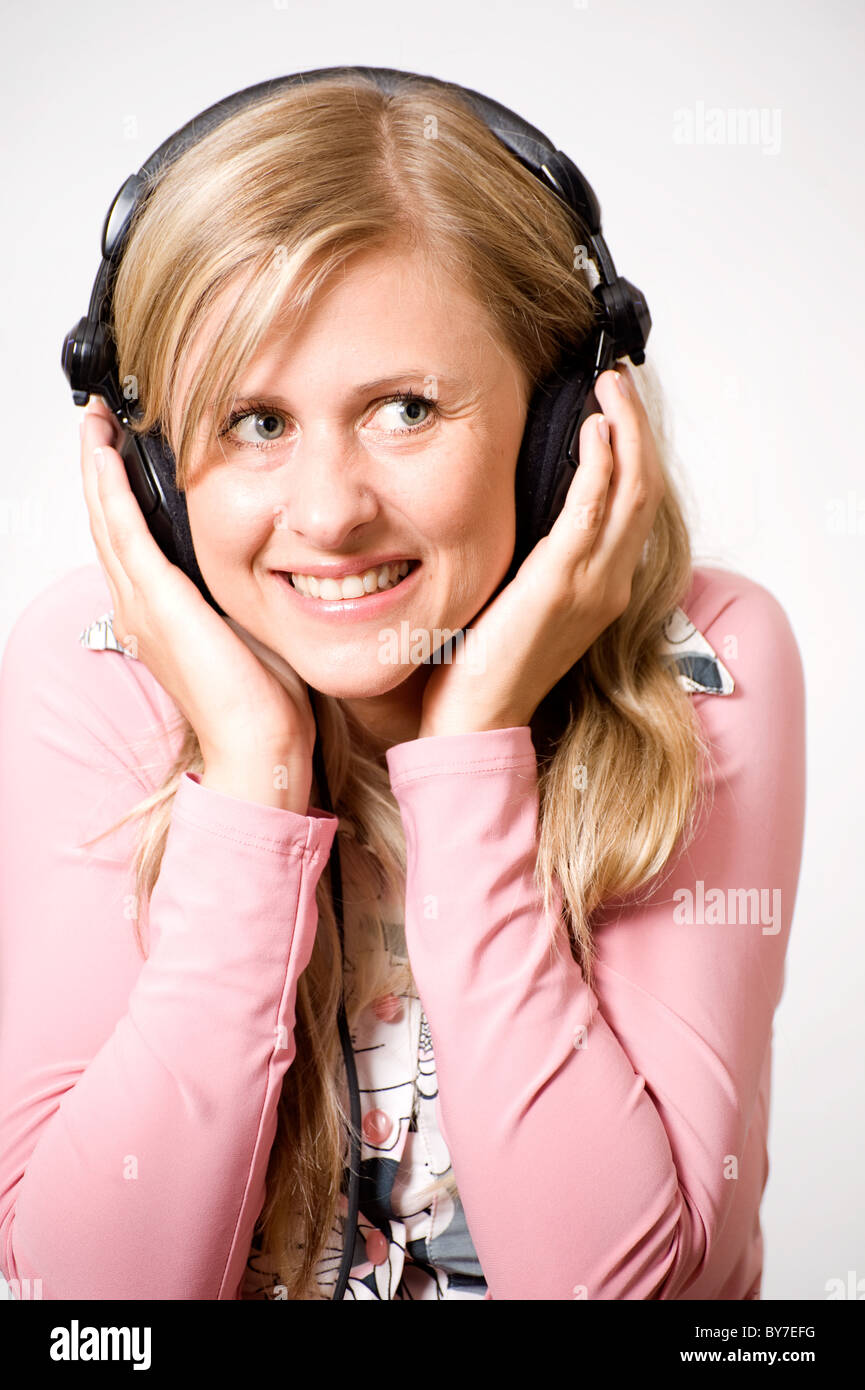 women with headphones Stock Photo - Alamy
