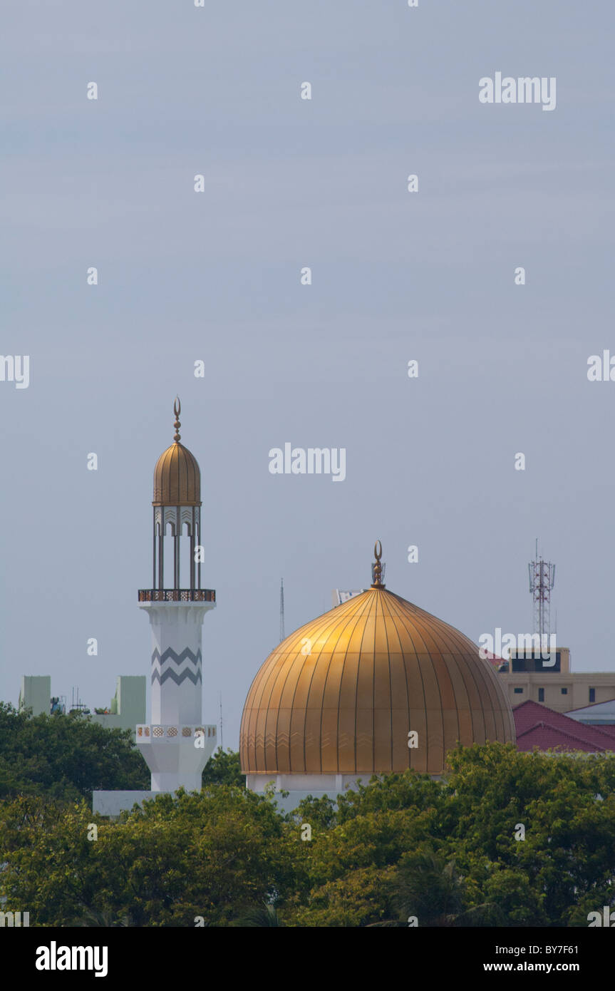 Maldives, Male, capital city of the Maldives archipelago. Gold dome ...