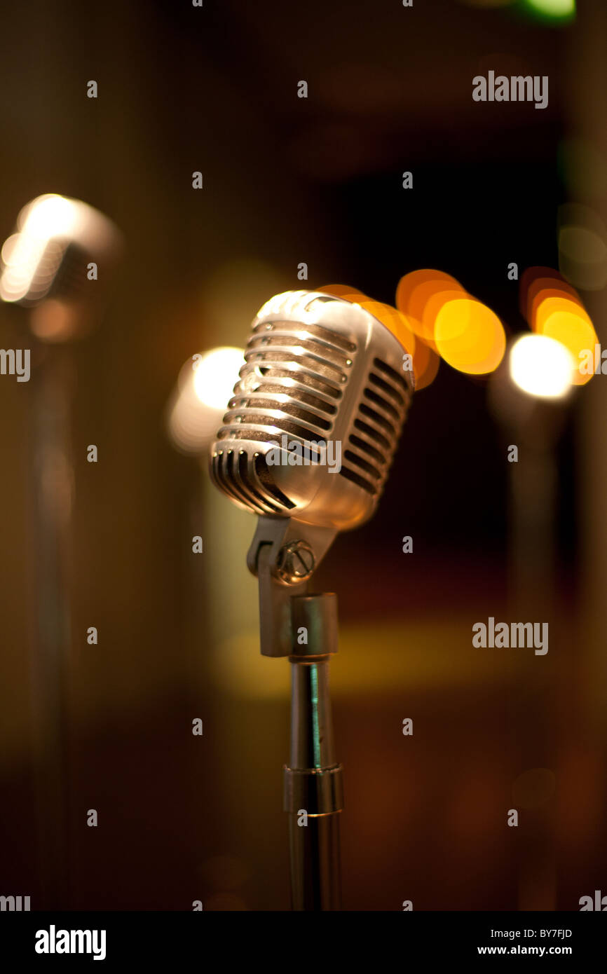 Microphone on a stage Stock Photo - Alamy