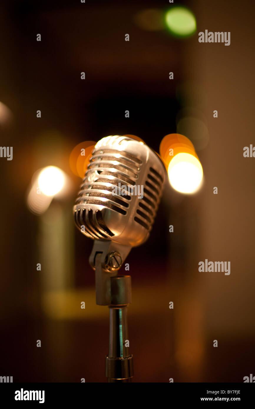 Microphone on a stage Stock Photo - Alamy