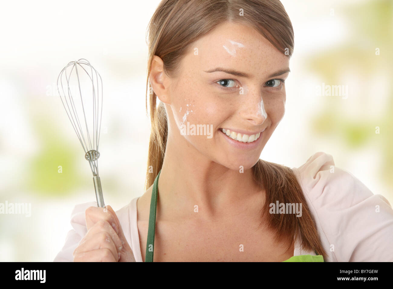 Young beautiful female cook Stock Photo - Alamy