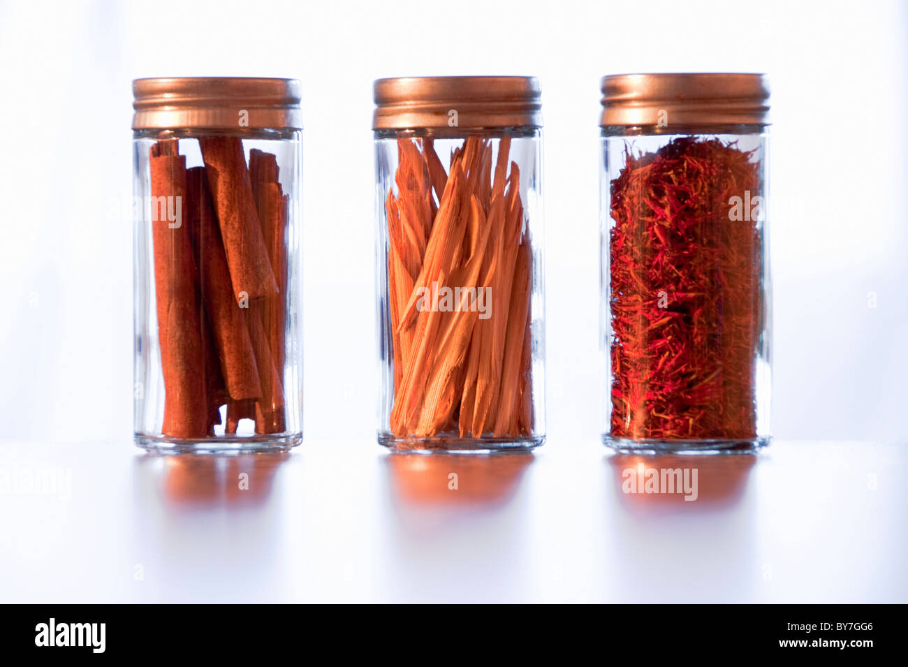 Studio shot of spices in glass containers Stock Photo - Alamy