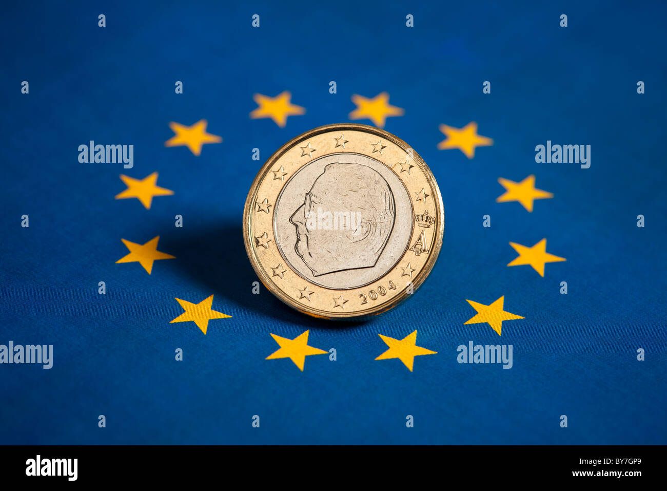 Belgian Euro coin on the flag of the European Union Stock Photo - Alamy