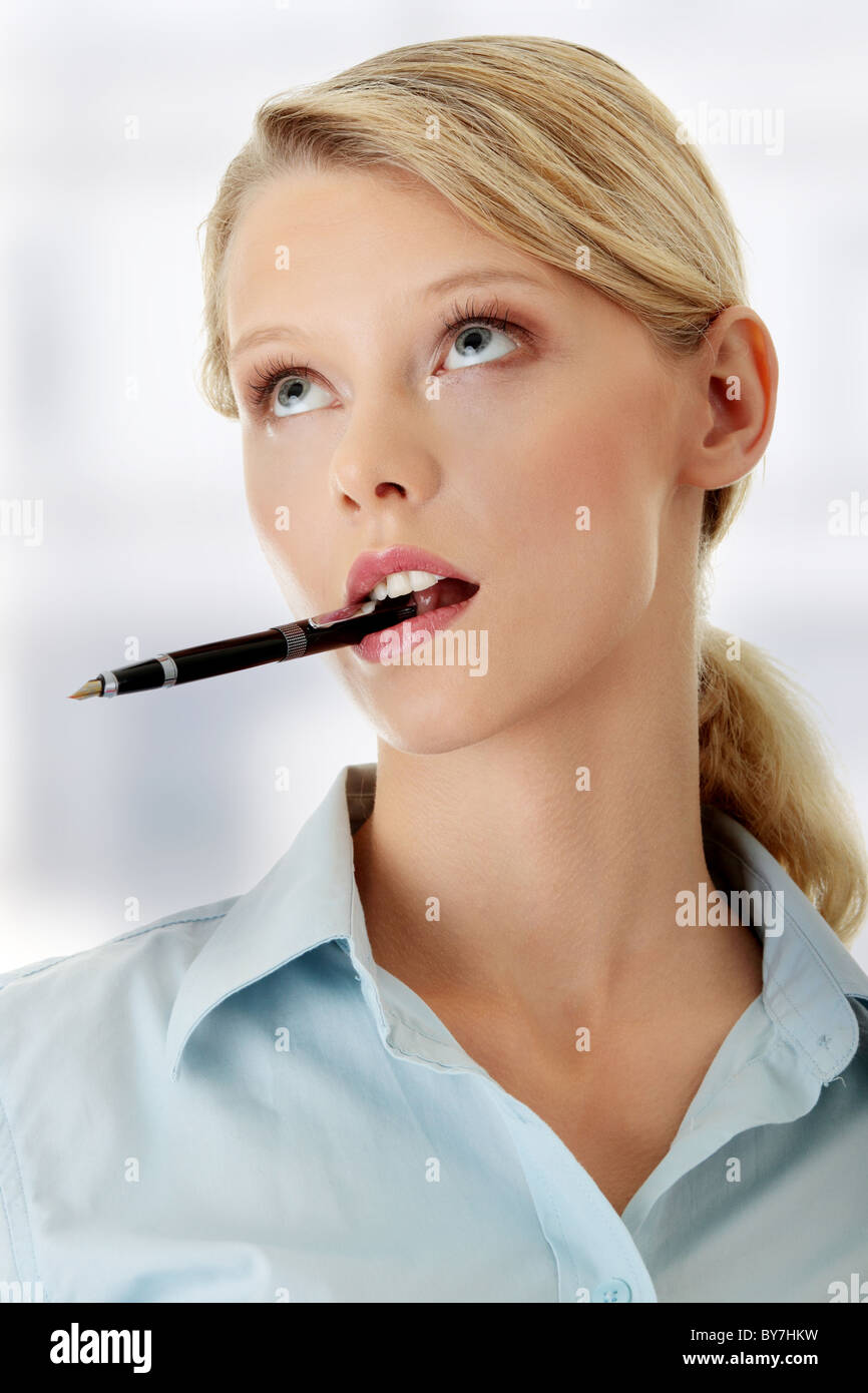 Young beautiful student girl with pen Stock Photo - Alamy