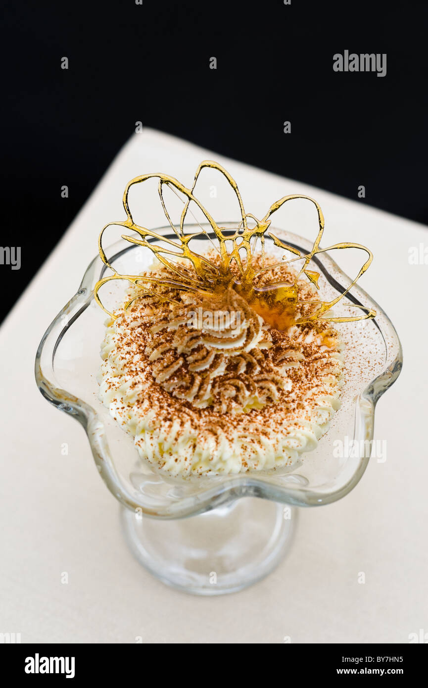 ice cream decorated with a caramel curl Stock Photo - Alamy
