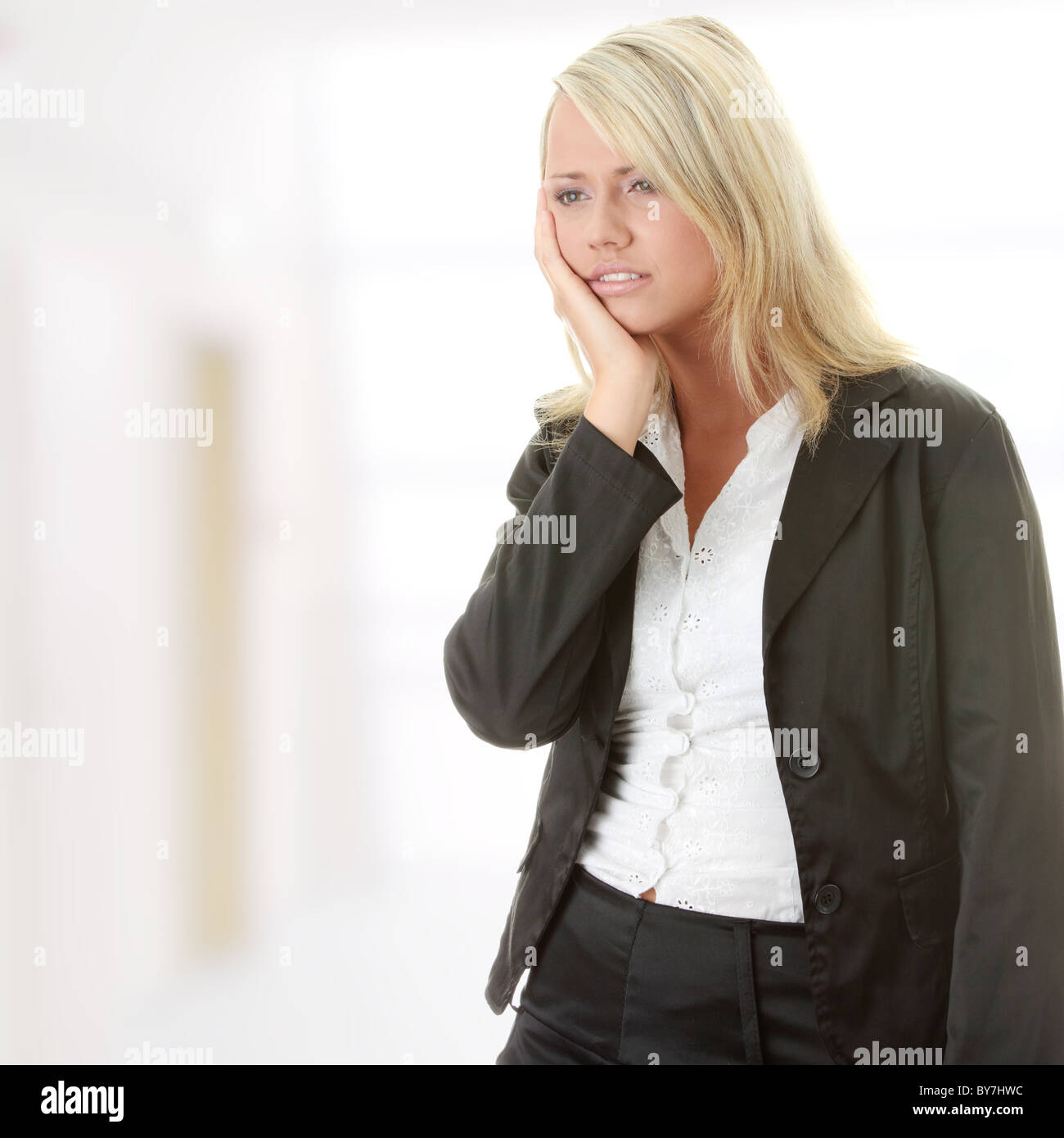 Photo of depressed female being worried by problems in business Stock Photo - Alamy
