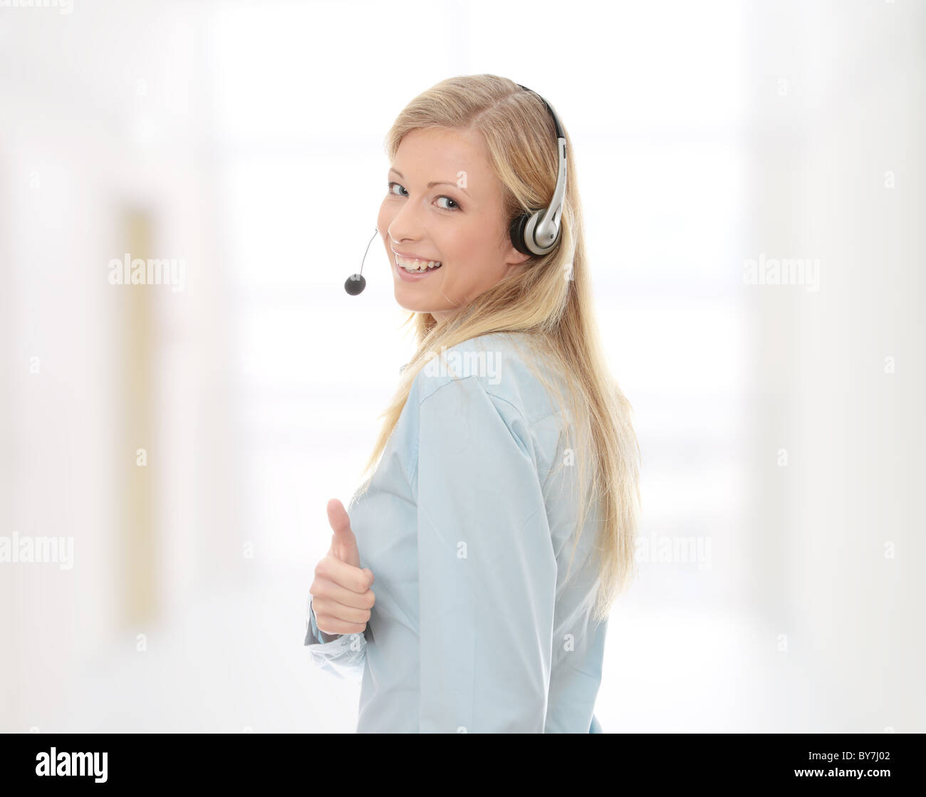 Call center girl thumbs up hi-res stock photography and images - Alamy