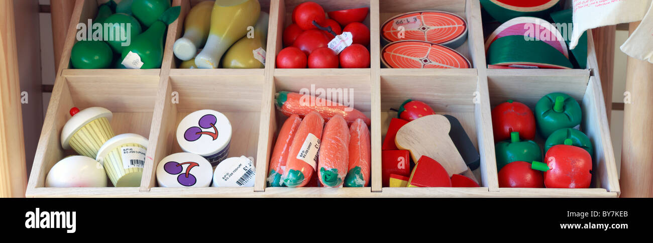 wooden play food in a tray Stock Photo - Alamy