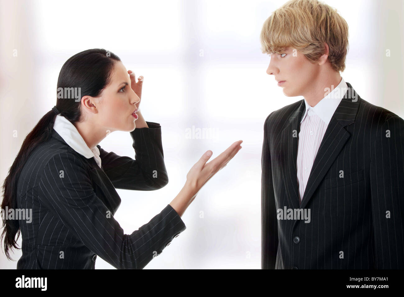 Work Colleagues arguing (woman shouting on man Stock Photo - Alamy