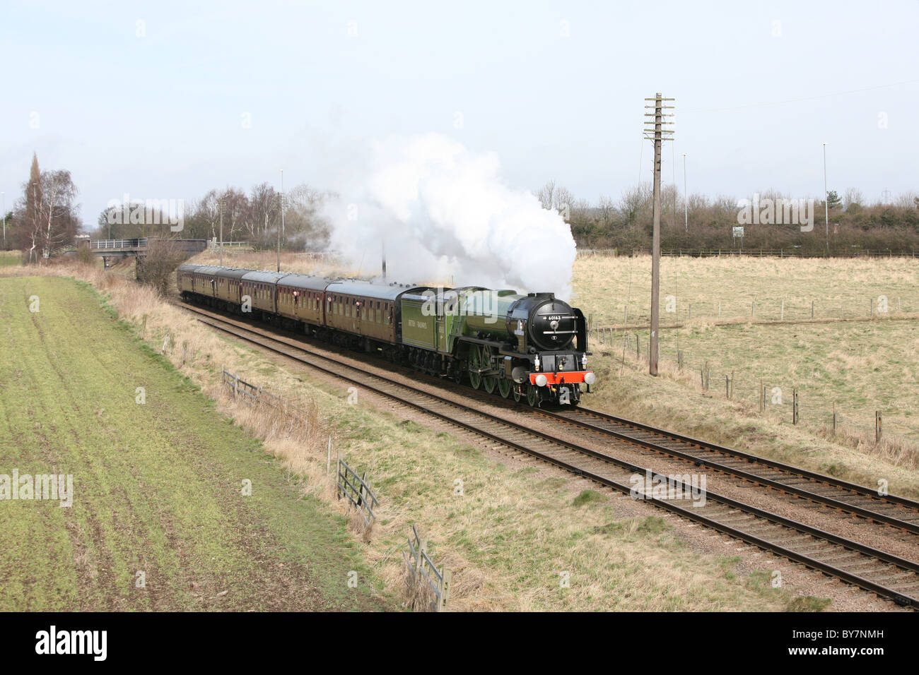 a steam train travelling through countryside after leaving the great ...