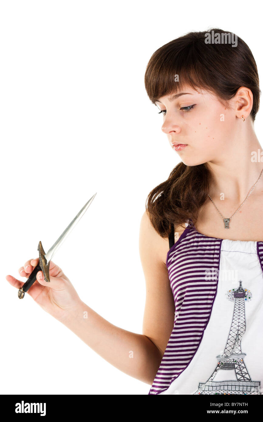 Beautiful girl with a knife pensive isolated on white Stock Photo - Alamy