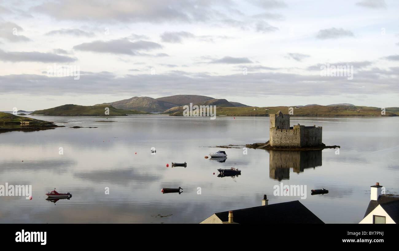 Kisimul Castle and boats in the bay at Castlebay, Isle of Barra, Outer ...