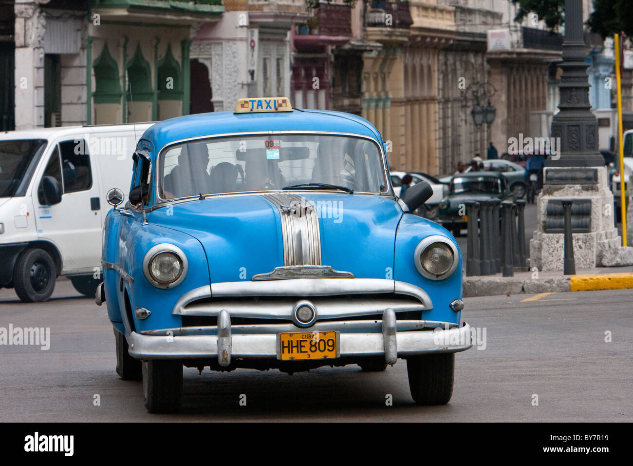 Cuba, Havana. American Cars from the 1950s provide taxi service around ...