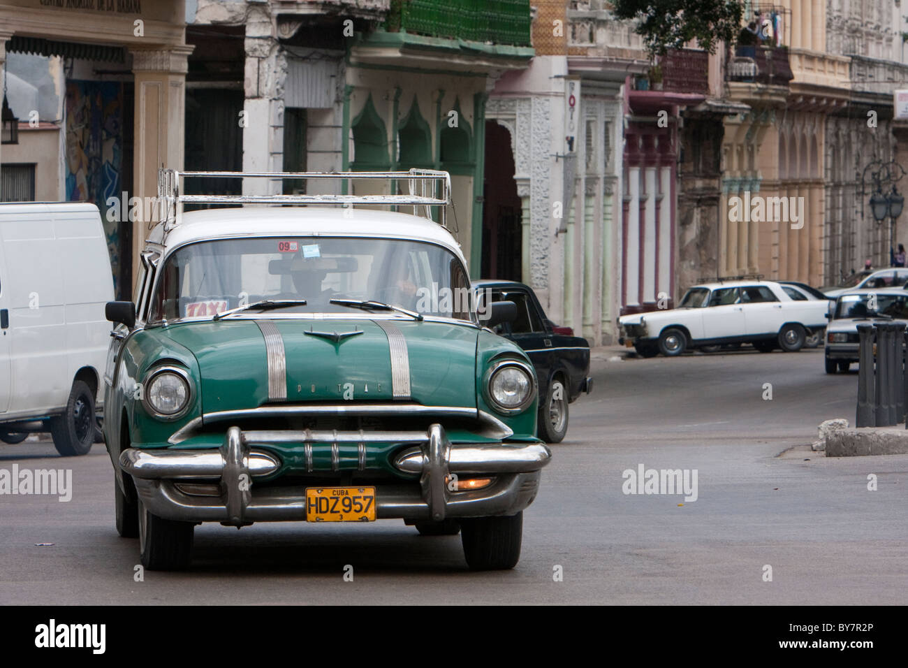 Cuba, Havana. American Cars from the 1950s provide taxi service around ...